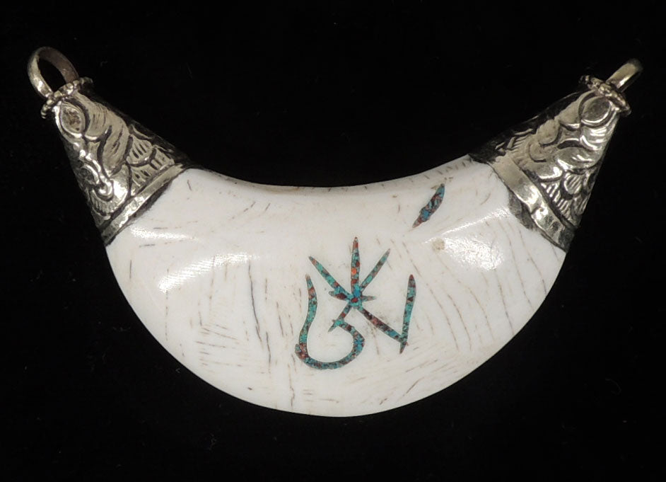 Tibetan Sacred Chank Shell and Silver Repoussé Pendant – Africa Direct